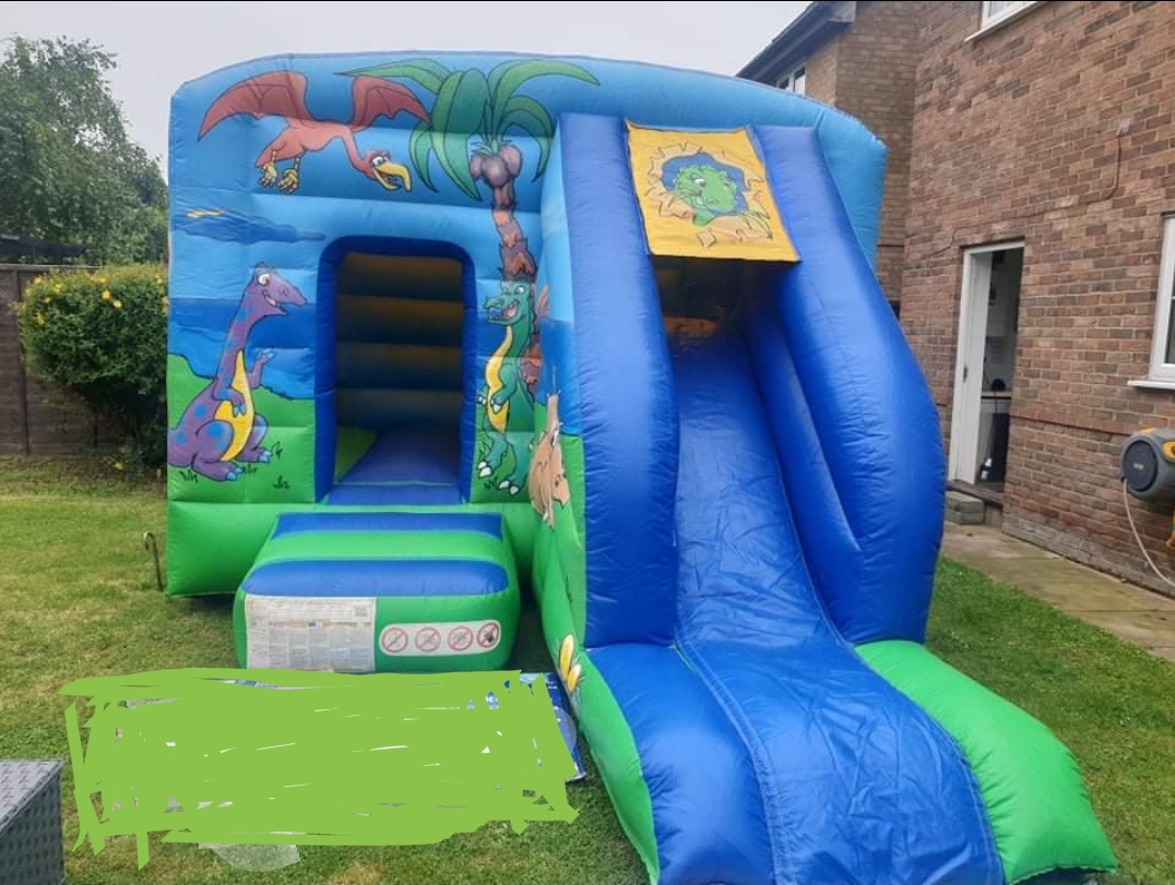 Dinosaur castle with slide Combi. - Bouncy Castle Hire in London ...