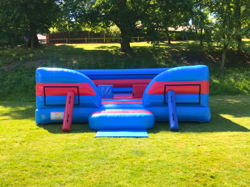Gladiators inflatable Hire - Inflatable, Bouncy Castle, Entertainment ...