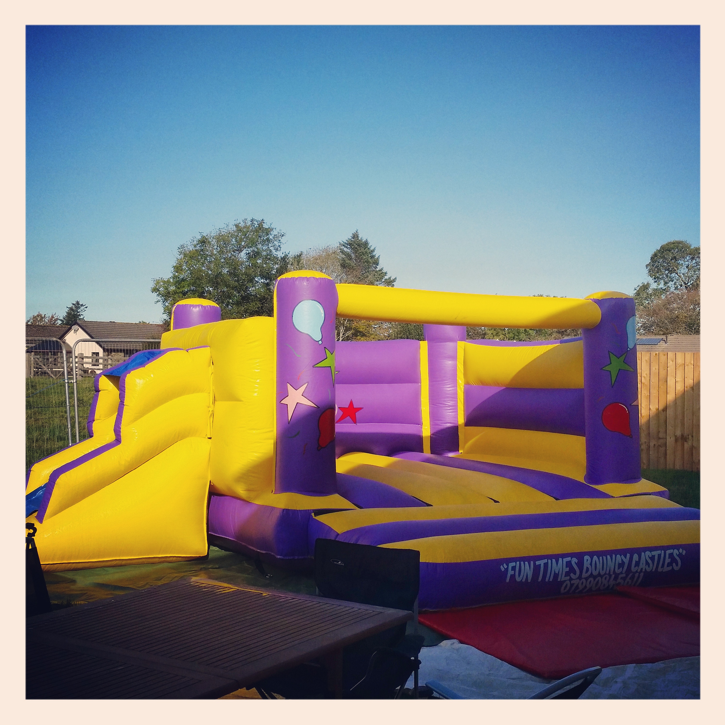 Pink & Yellow Bounce & Slide Bouncy Castle Hire Swansea