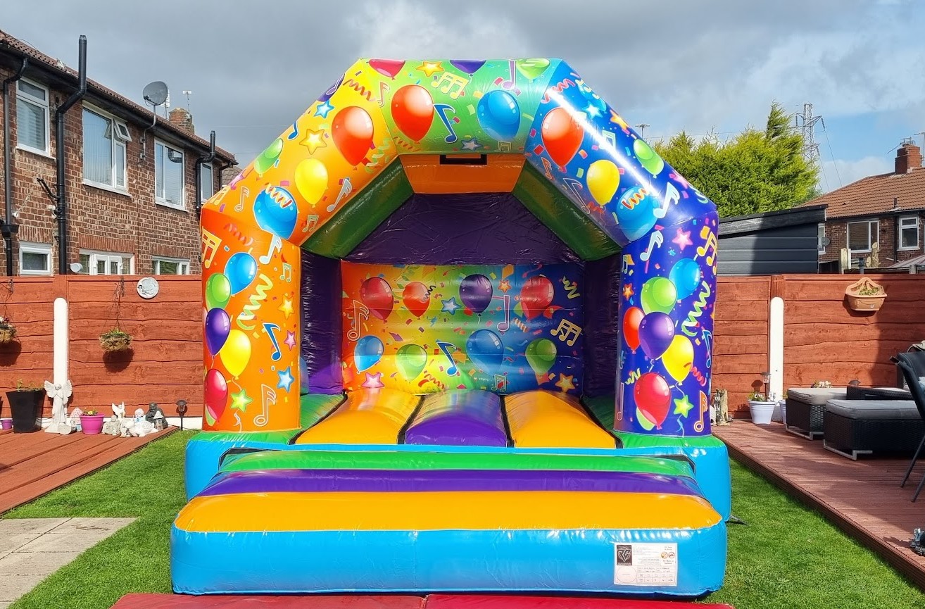 Multi Coloured Party Time Bouncy Castle Hire - Born 2 Bounce