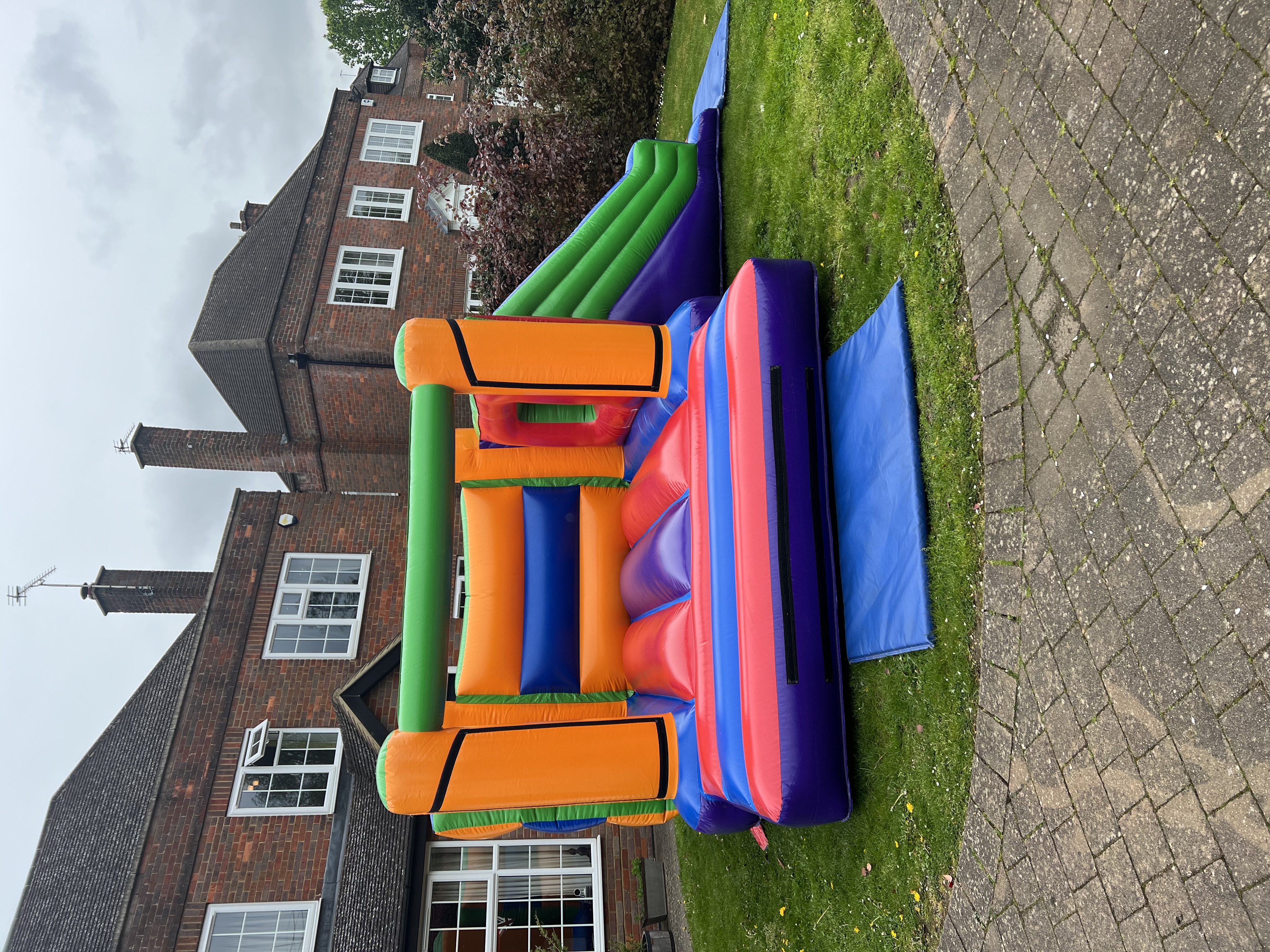 Multi Colour Bouncy Castle N Slide - Hire in Hertfordshire | Jumping ...