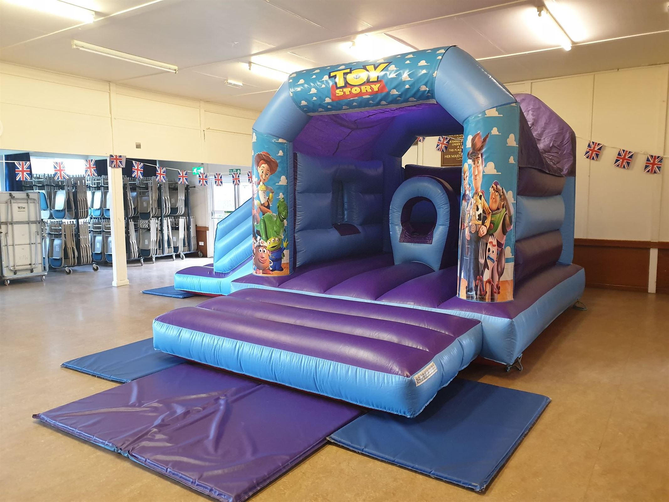 Toy Story Activity Bouncy Castle with Side Slide - Bouncy Castle Hire ...