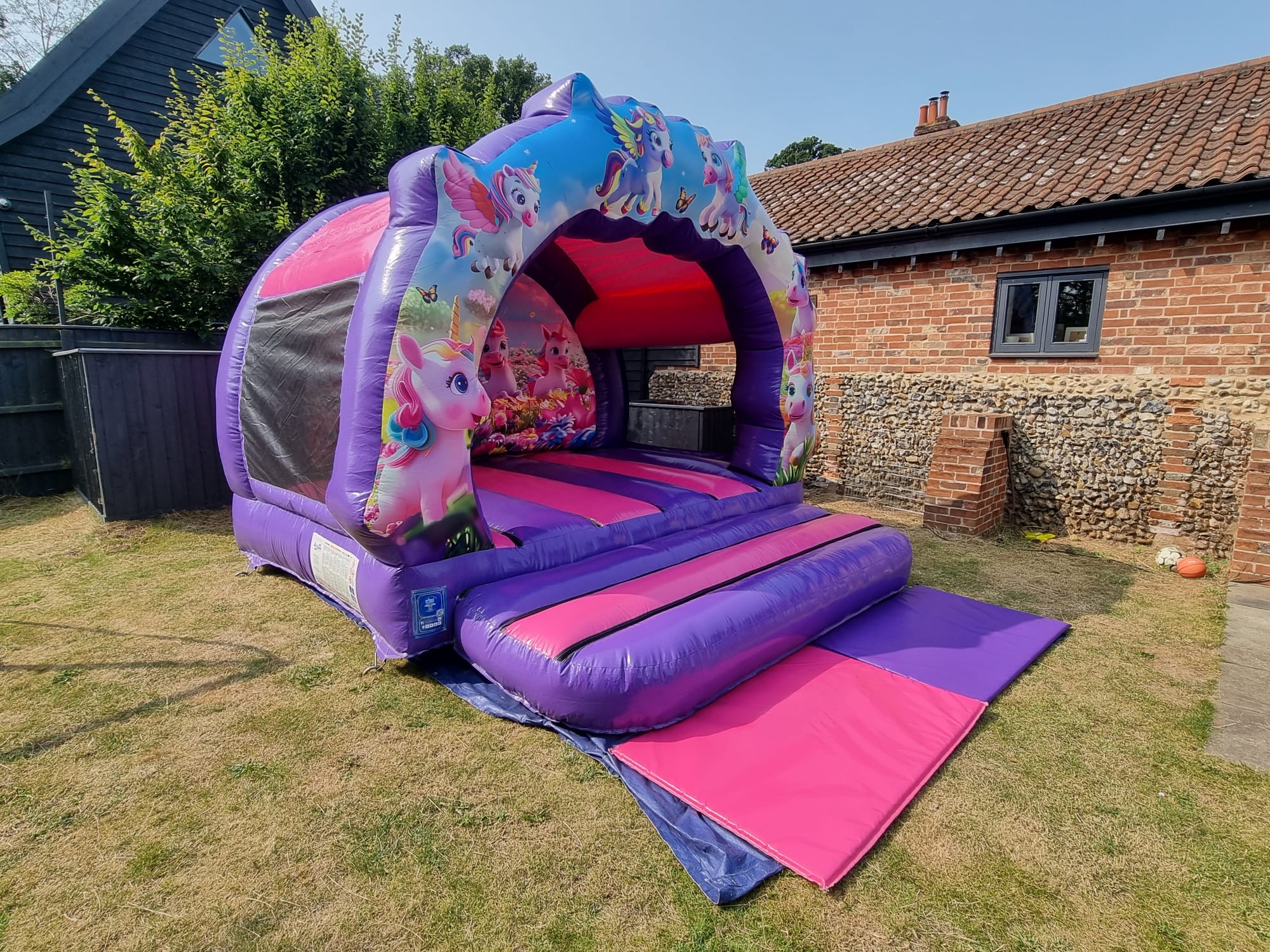 13 x 14 Unicorn Contoured Castle - Hire in Ipswich | BounceBack Inflatables