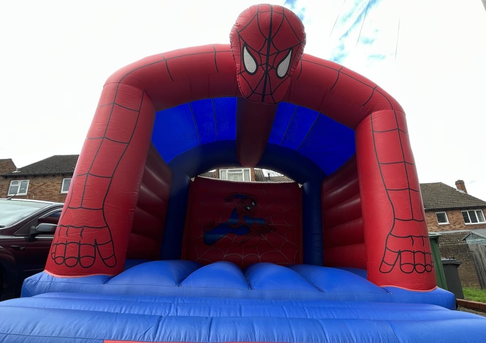 Spiderman Castle Bouncy Castle Hire Slide Kids Party Games and Soft Play in Marlow High Wycombe Henley Maidenhead Beaconsfield their surrounding areas Henley Bouncy Castles LTD